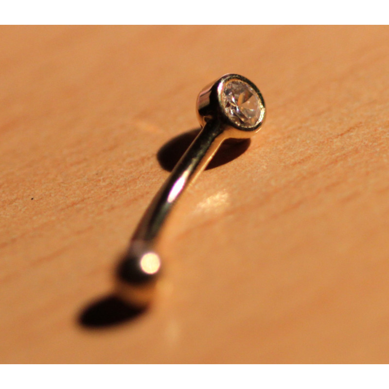 Piercing arcade en or jaune et zirconium